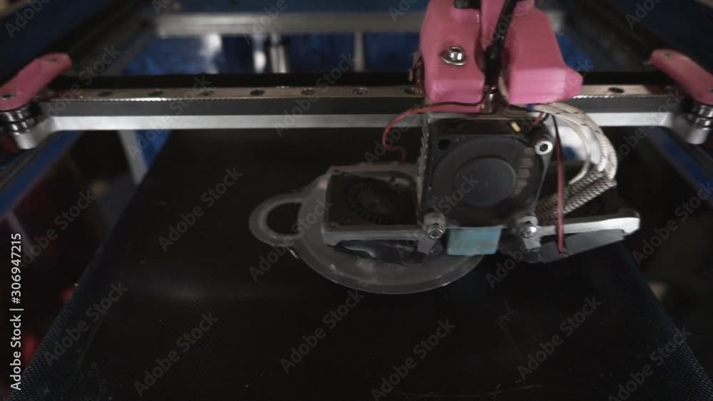 3D printer is working. Modeling using a 3D printer. 3D printer prints ...
