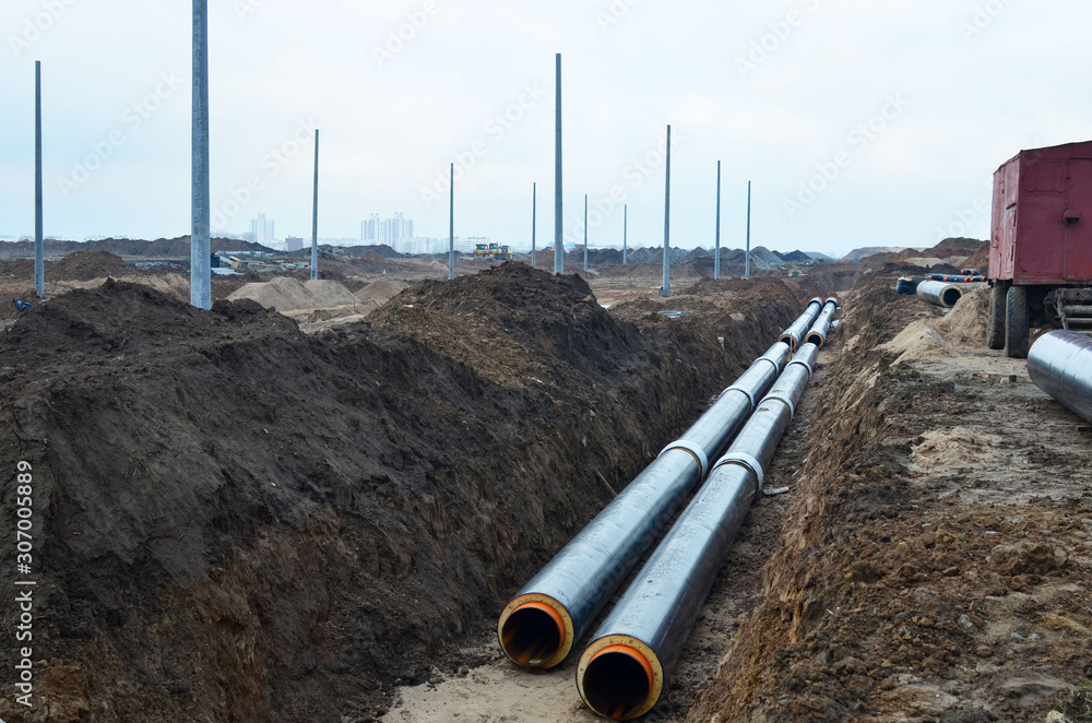 Laying underground storm sewers at a construction site. Groundwater ...