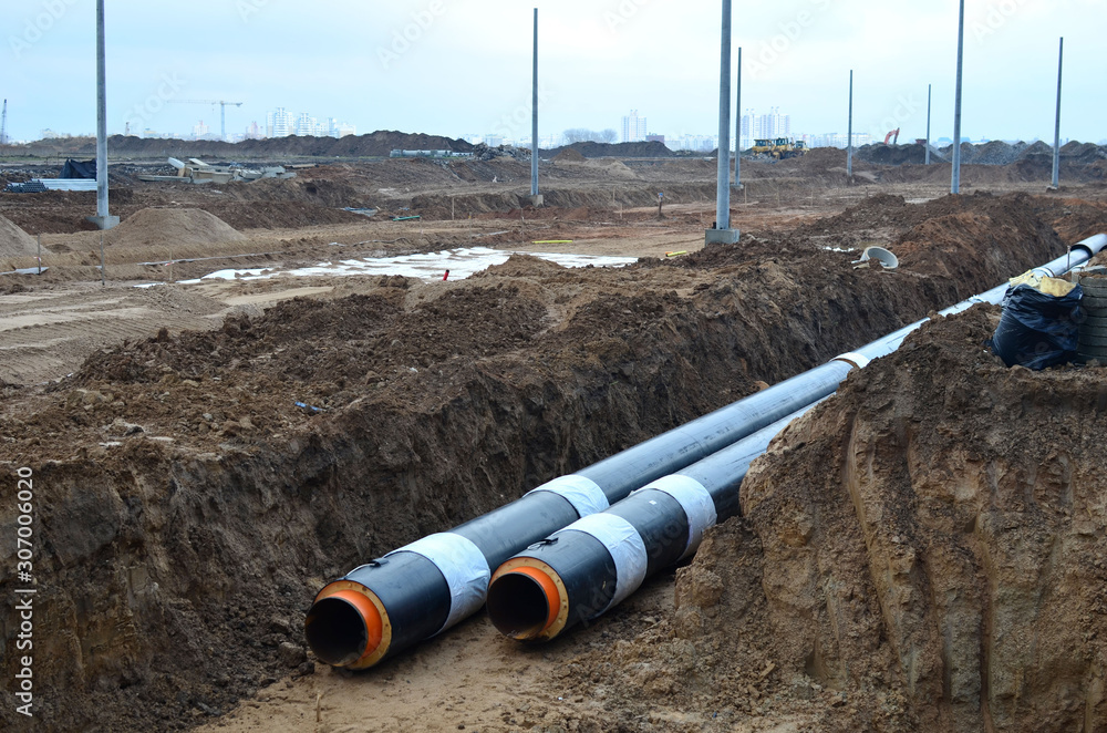Laying underground storm sewers at a construction site. Groundwater ...
