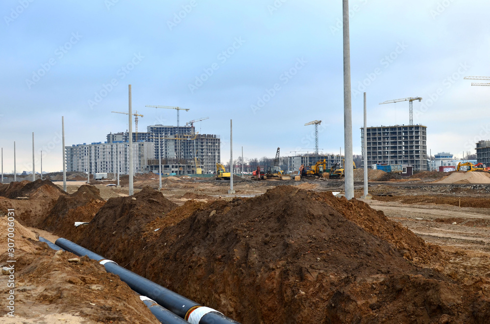 Laying underground storm sewers at a construction site. Groundwater ...