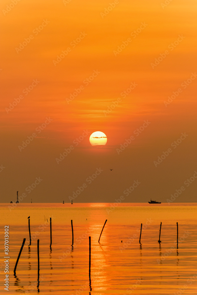 Beautiful nature landscape bright yellow sun reflecting orange light on ...