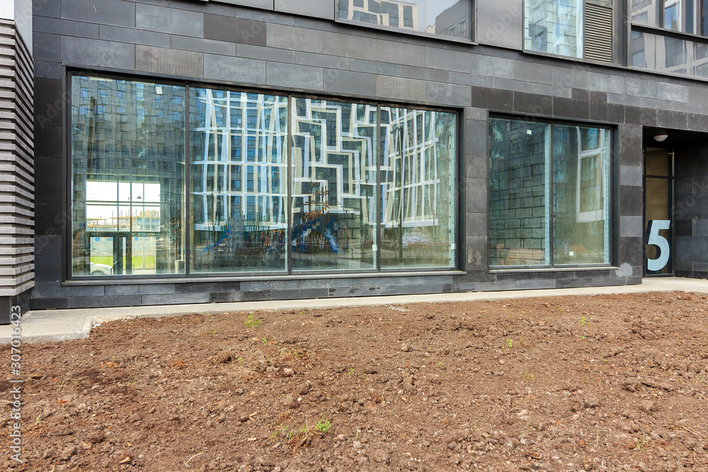Panoramic window of modern residential building view outside ...