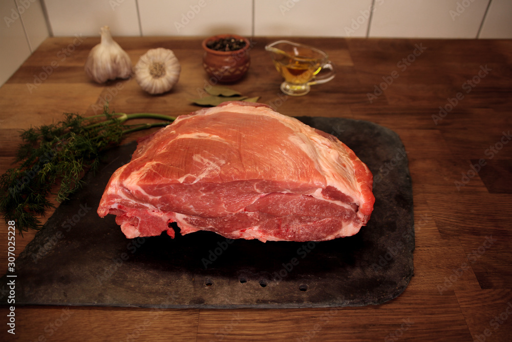 beautiful juicy pickled piece of raw meat lies on the board, a big ...