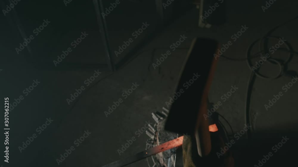 Forge workshop. Smithy manual production. Hands of smith with hammer ...