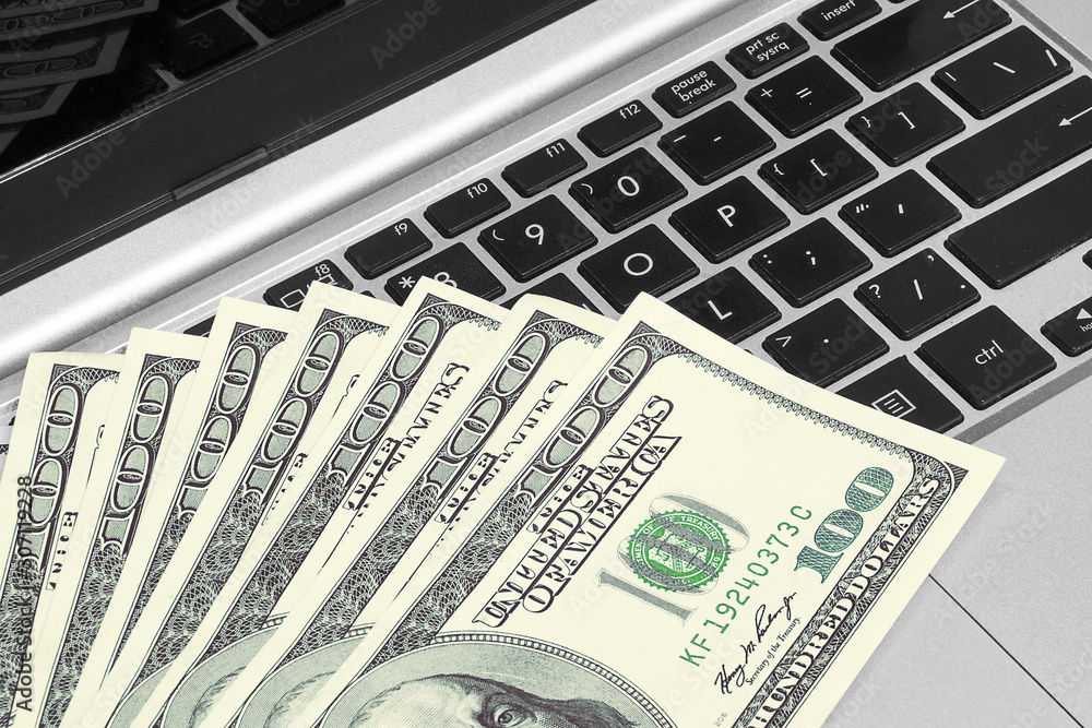 Freelance Concept. Laptop and Dollars. Money and Computer Keyboard. US ...