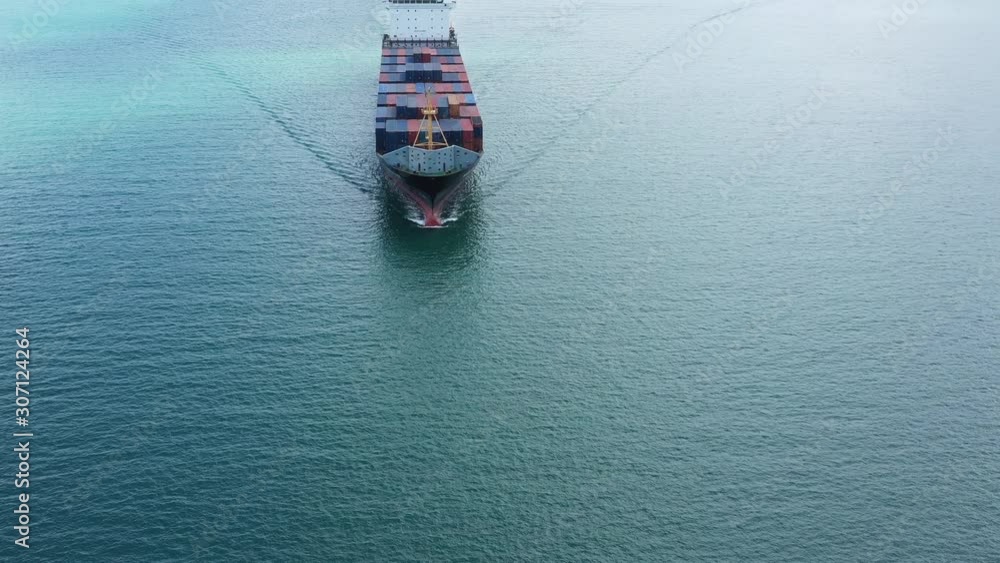 Stockvideo International Containers Cargos ship in the blue ocean ...