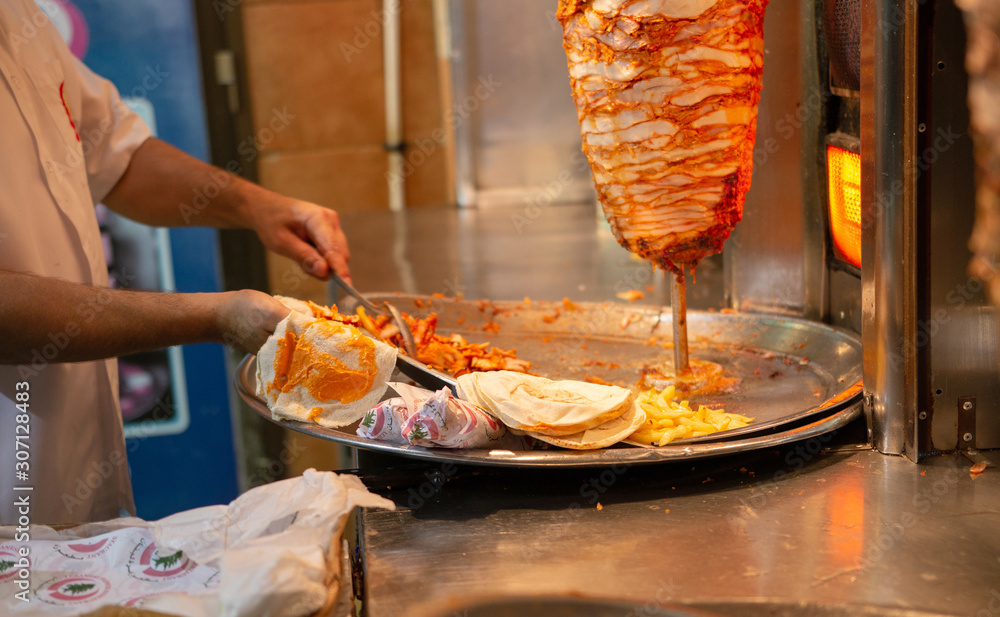 Chef making a shawarma Stock Photo | Adobe Stock