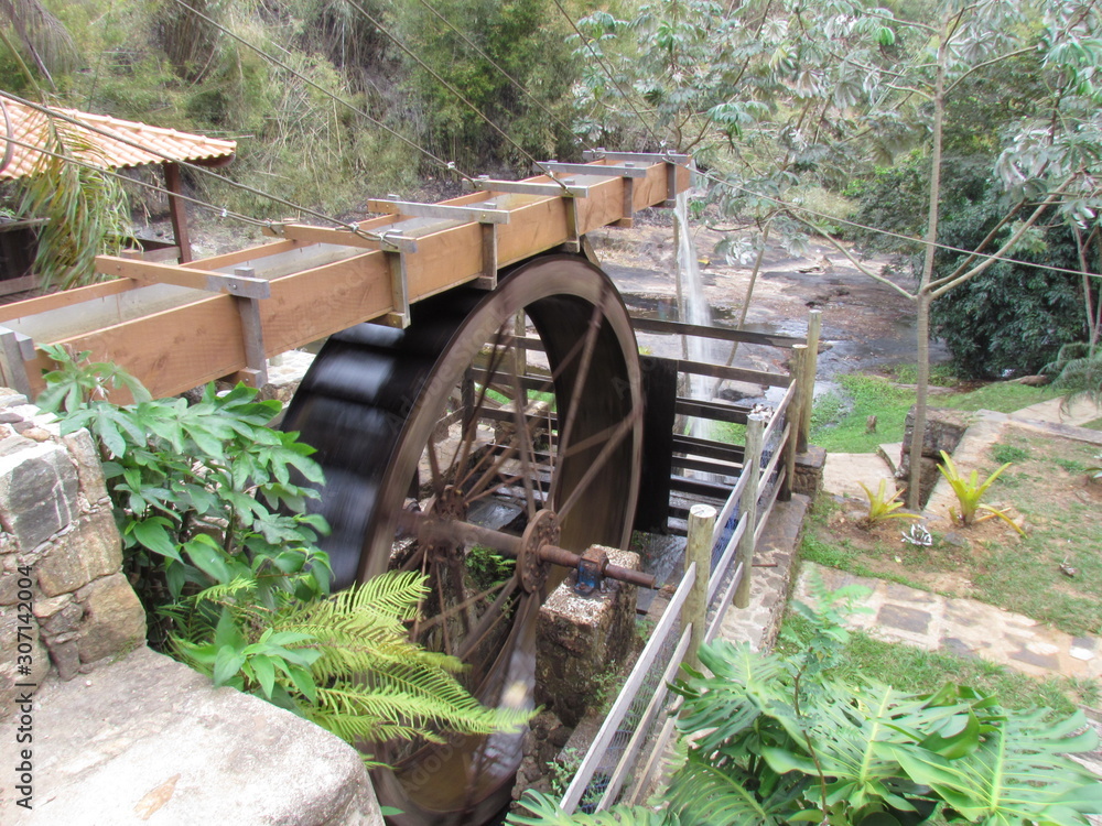 Water powered mill diverted from the river. foto de Stock | Adobe Stock