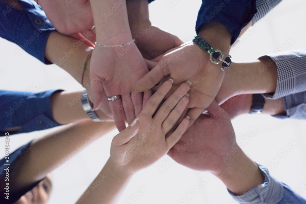 College Students Teamwork Stacking Hand Concept. Close up of young ...