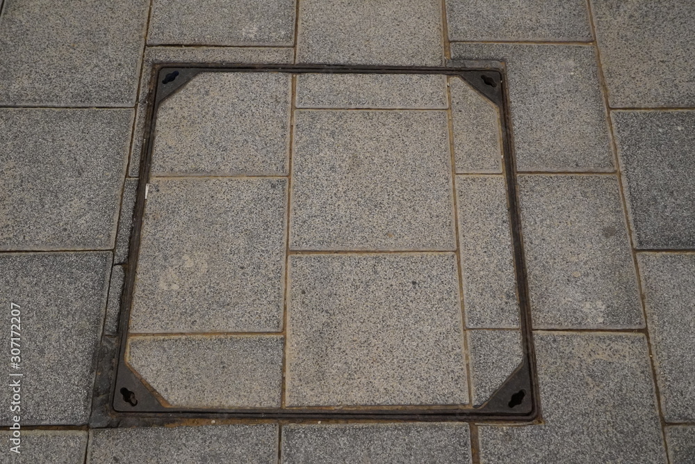 Hidden square manhole cap, grunge manhole cover. Cast iron manhole ...