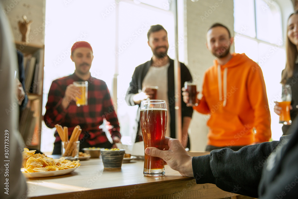 Happy co-workers celebrating while company party and corporate event ...