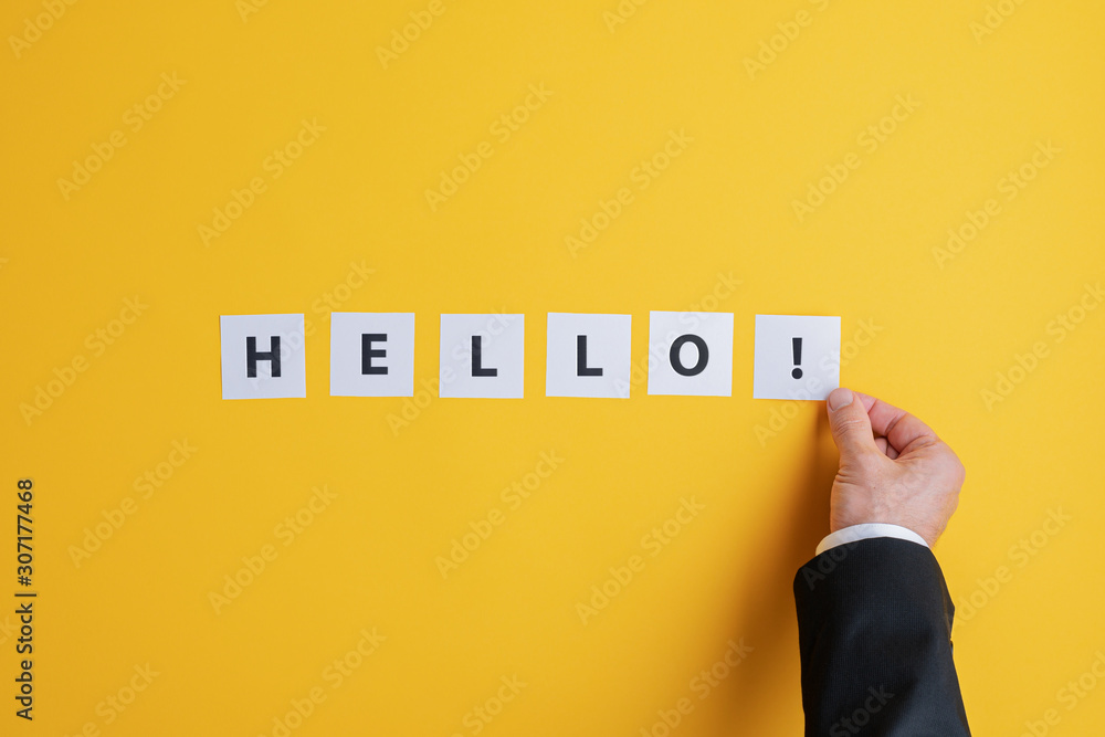 Businessman making a Hello sign Stock Photo | Adobe Stock