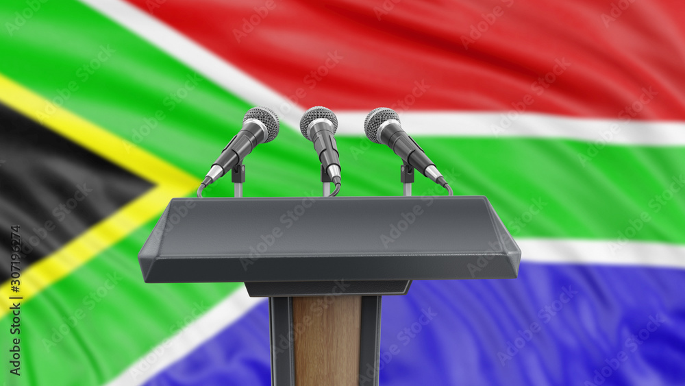 Podium lectern with microphones and South African republic flag in ...