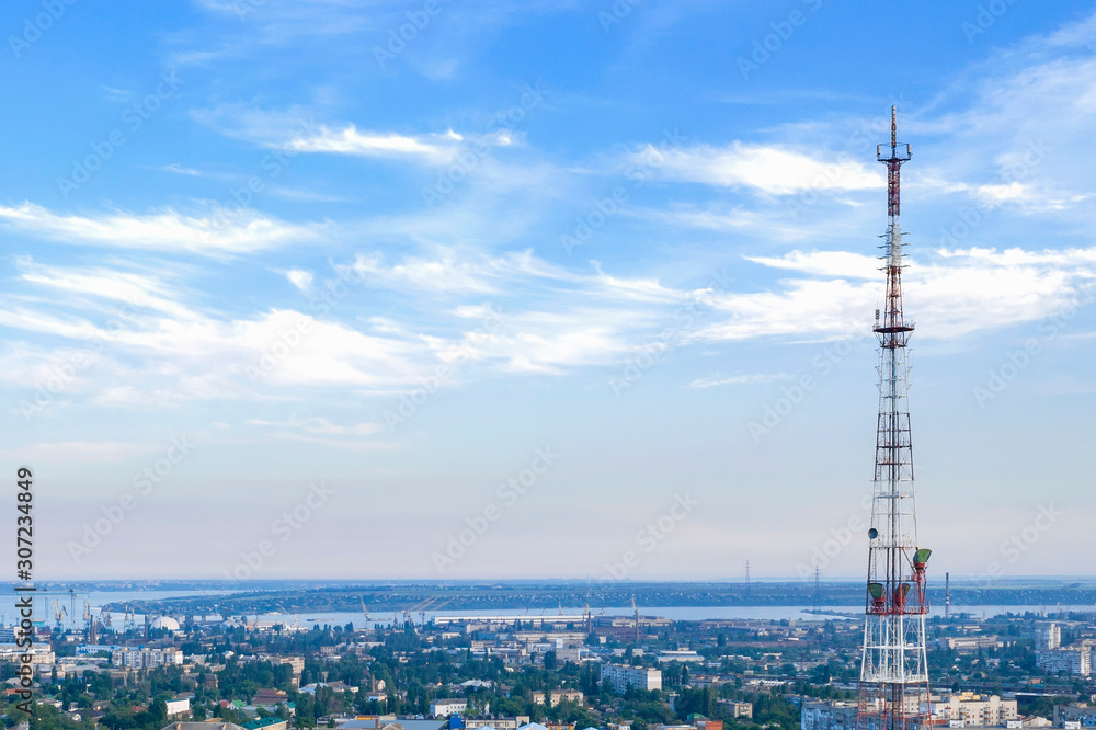 High television tower in the city center. Telecommunication tower of 4G ...