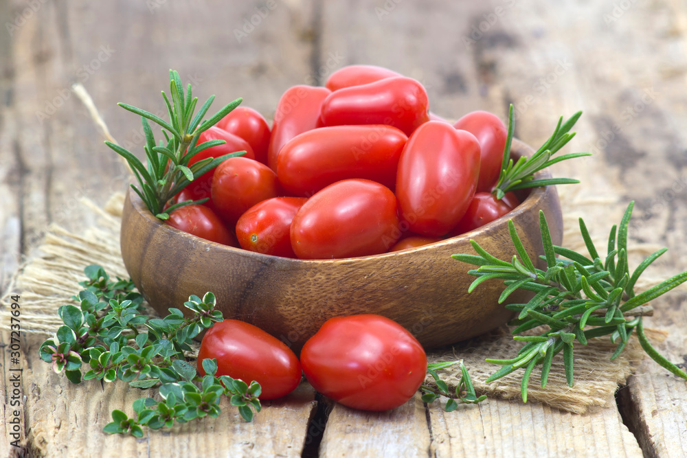 mini roma tomatoes and herbs Stock Photo | Adobe Stock