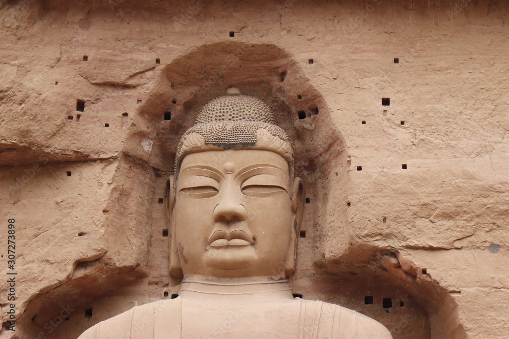 Buddha statue at Bingling Cave Temple in Yongjing, Gansu Province ...