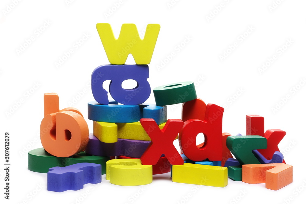 Colorful wooden alphabet, spelling and number blocks, isolated on white ...