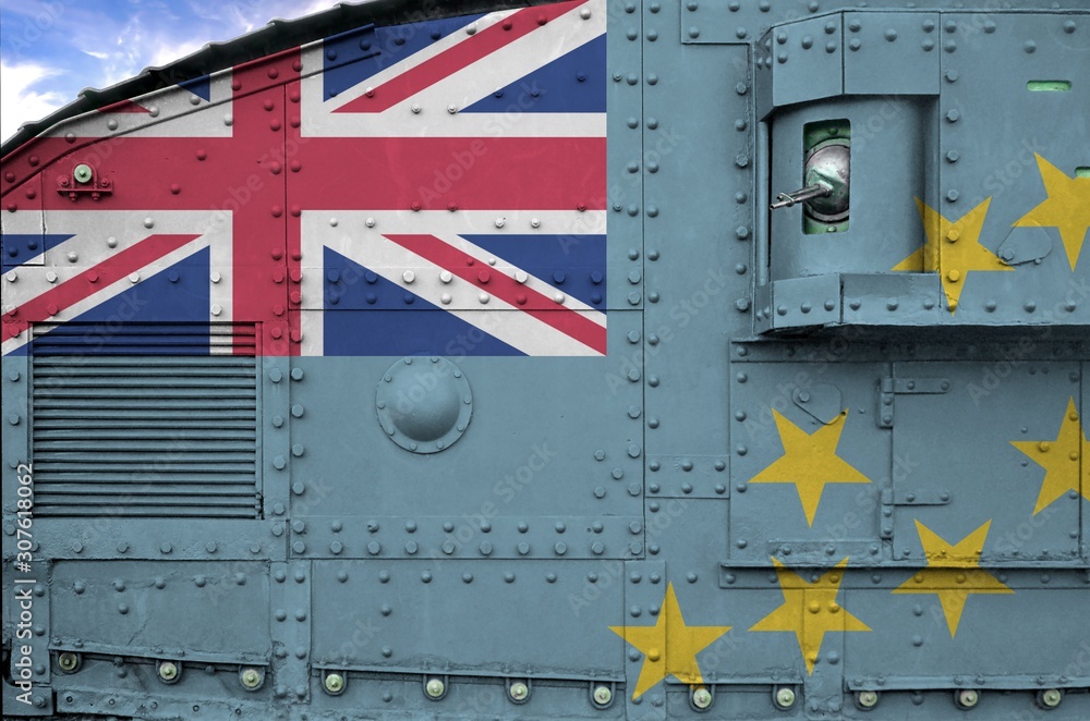 Tuvalu flag depicted on side part of military armored tank closeup ...