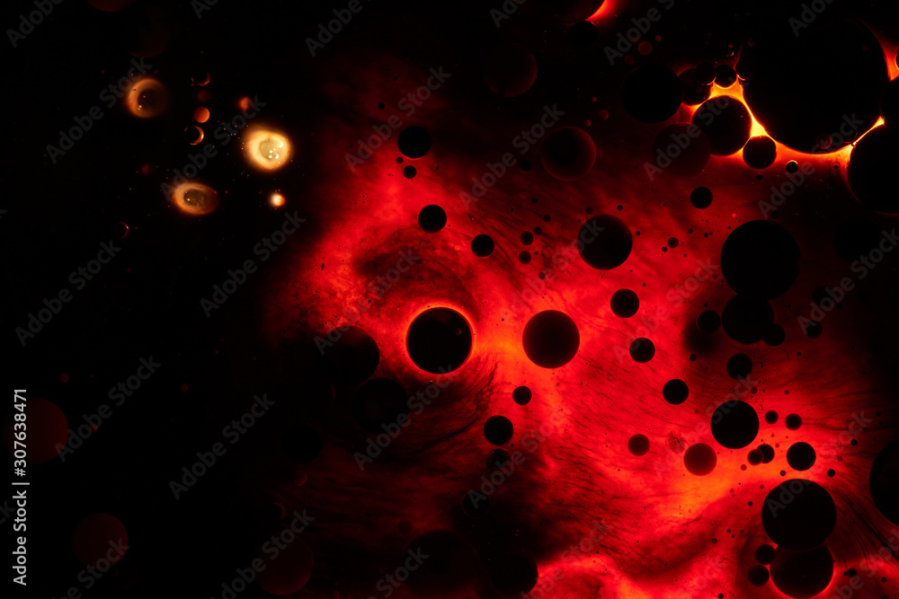 Abstract outer space background. Black red planets and stars, big bang ...
