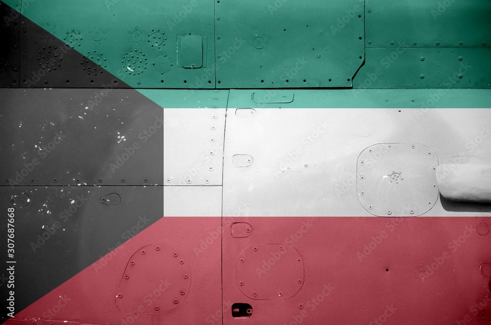 Kuwait flag depicted on side part of military armored helicopter ...