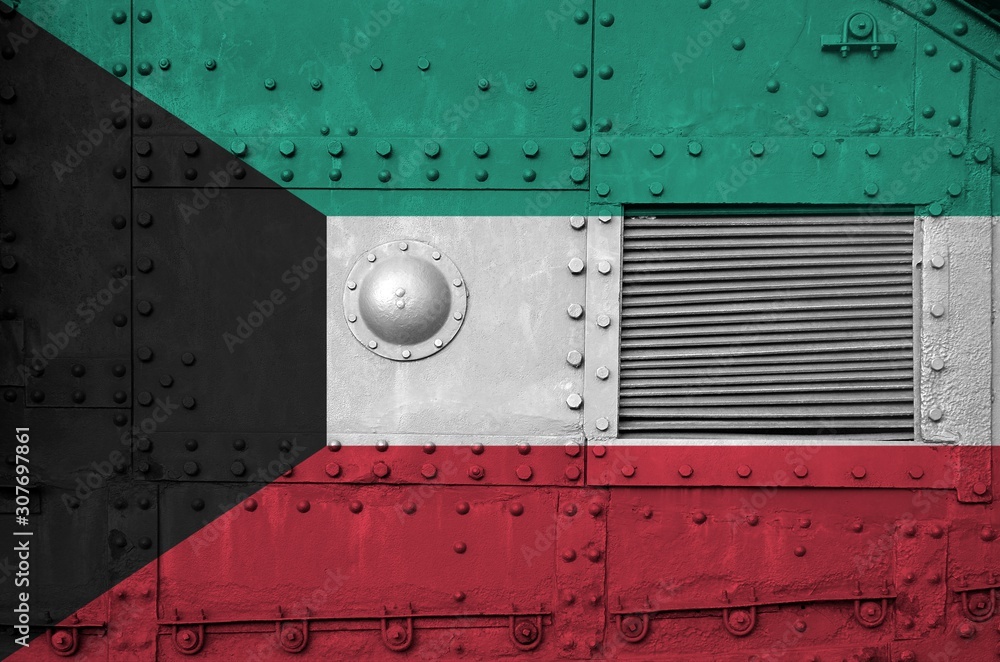 Kuwait flag depicted on side part of military armored tank closeup ...