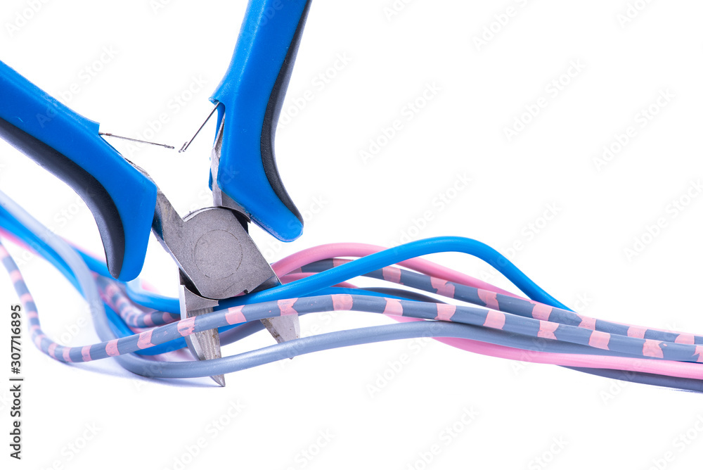 Colorful wiring and tool pliers used in electrical installation ...