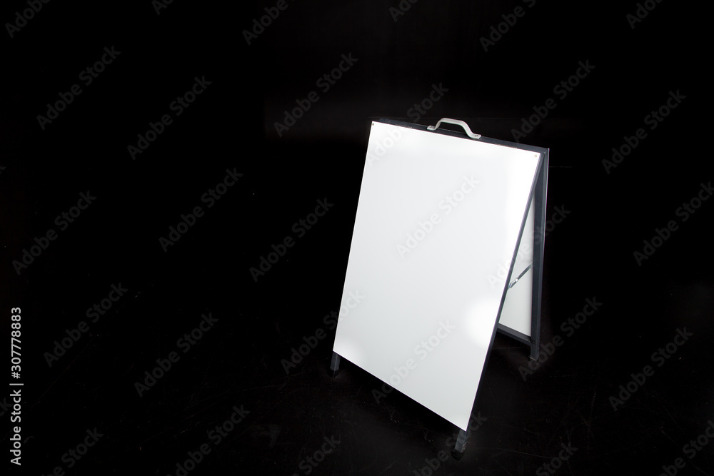 Blank folding sign or a-frame on black background Stock Photo | Adobe Stock