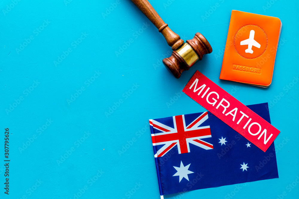 Migration to Australia concept. Australian flag near passport and judge ...