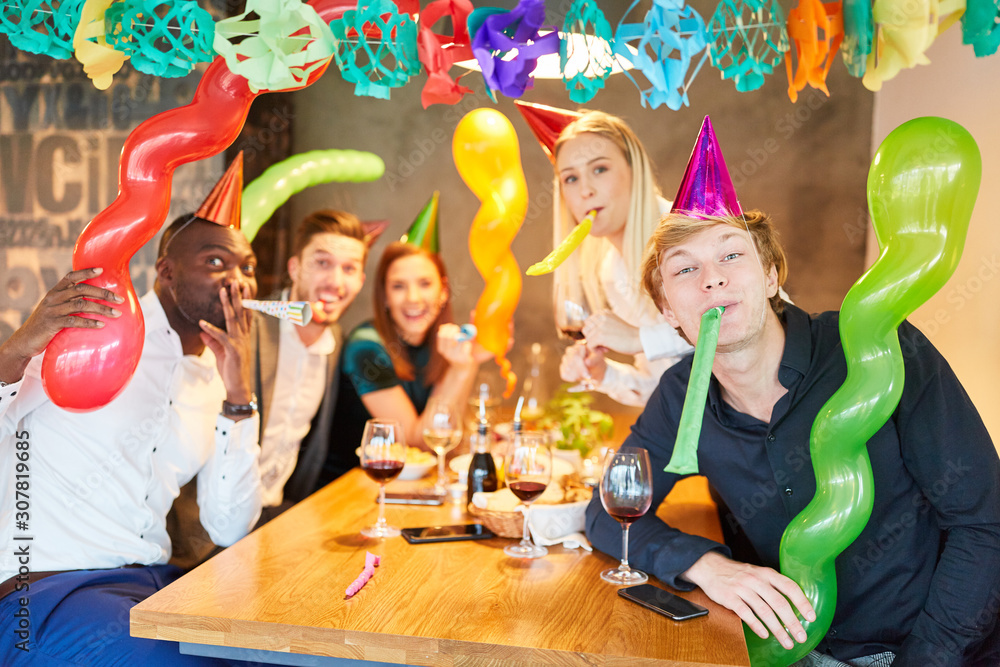 Friends celebrate party with colorful decoration in carnival Stock ...