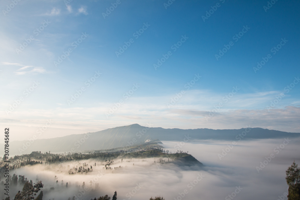Volcano Bromo at sunset time background near Cemoro lawang village at ...