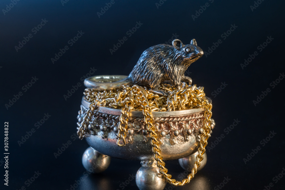 Composition from metal figures: a rat sits in a pot of gold. Products ...