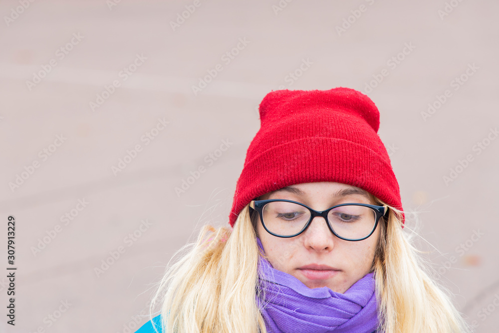 neutral facial expression girl portrait in warm autumn season clothes ...