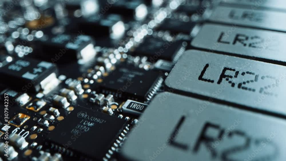 Macro Camera Moving Slowly over Printed Circuit Board, showing Computer ...