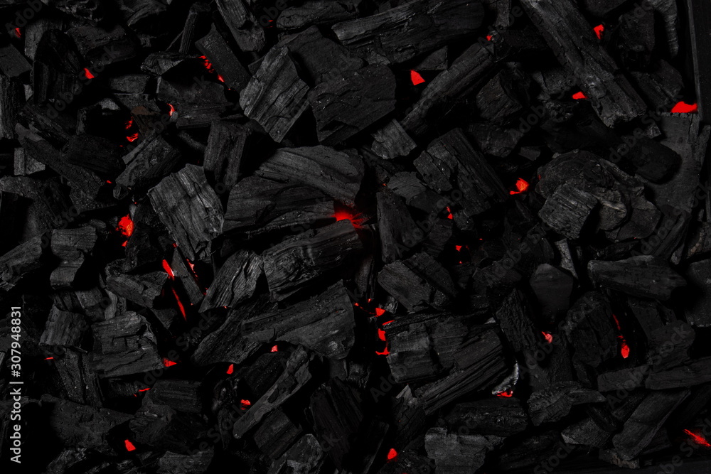 Charcoal background illuminated with red light underneath Stock Photo ...