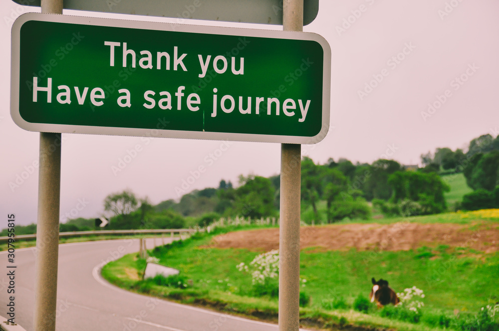Thank You Have A Safe Journey Sign By The Side Of The Road Stock Photo