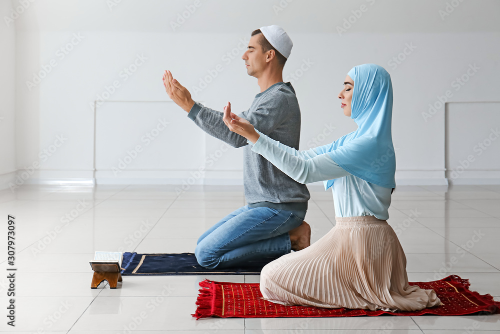 Muslim Couples Praying