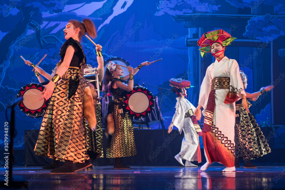 Traditional Japanese performance. Group of actresses in traditional ...