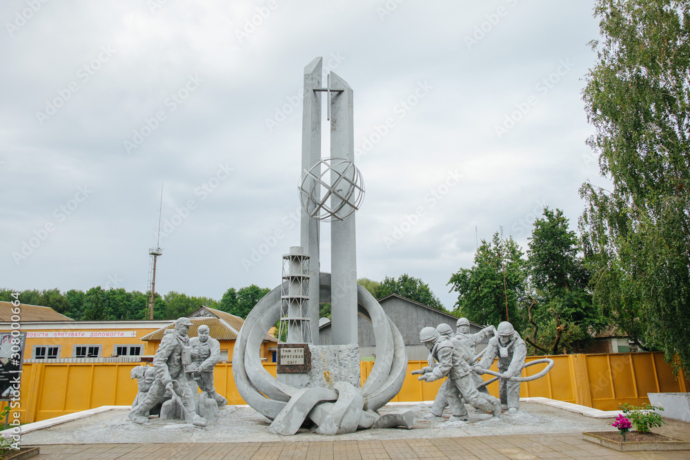 Statue in Chernobyl commemorating the first responders who arrived at ...