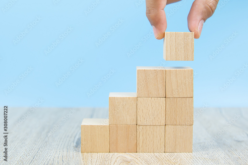 Hand choose cube shape wooden block toy stacked without graphics for ...
