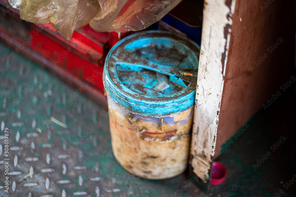 A dirty chemical plastic box without MSDS (material safety data sheet ...