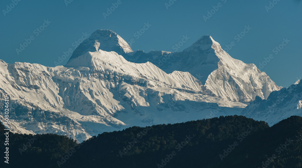 A view of a landscape of scenic Himalayas peaks from a hillside in the ...