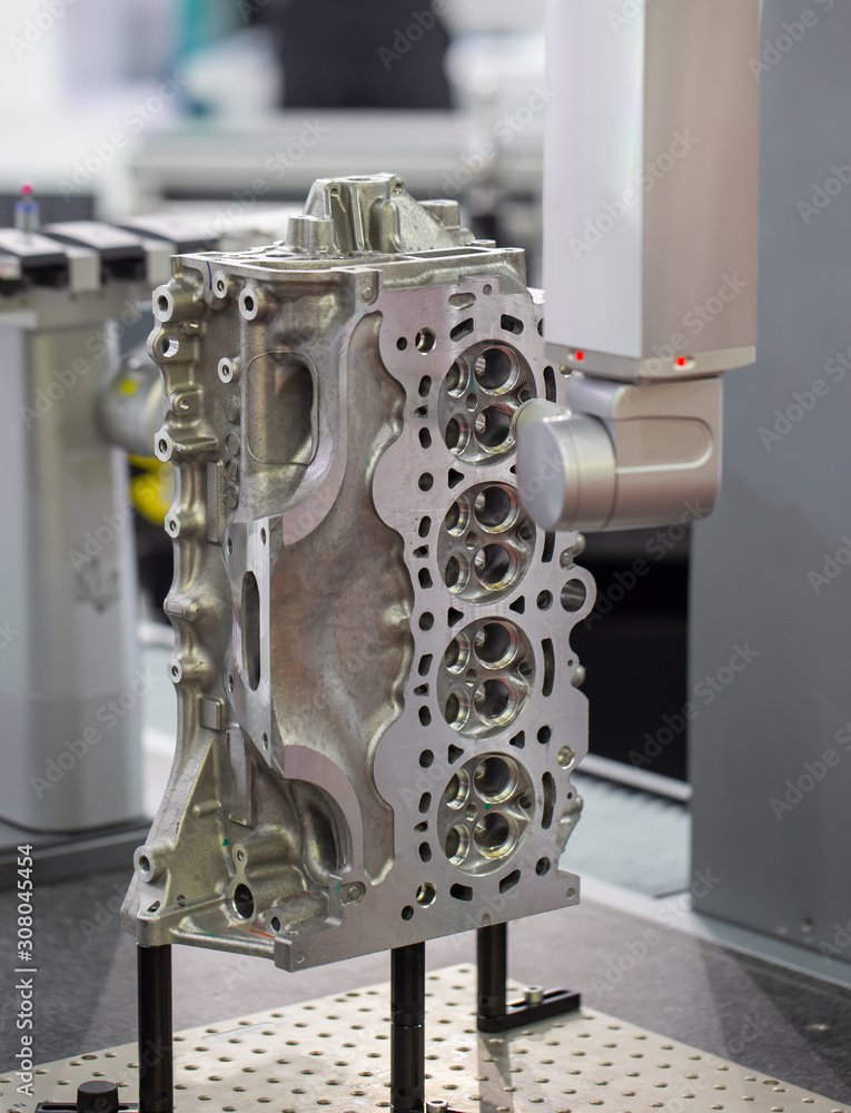 CMM Coordinate Measuring Dimension Machine inspecting engine part ...