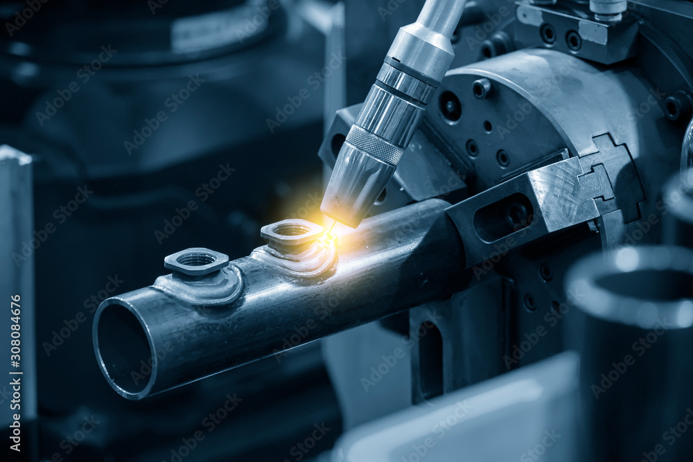 The abstract scene of robotic arm welding machine . The hi technology ...