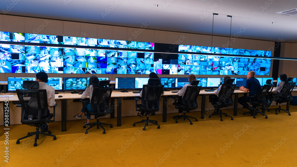 Foto de Team of secret agents in uniforms, monitoring cyber, video and ...