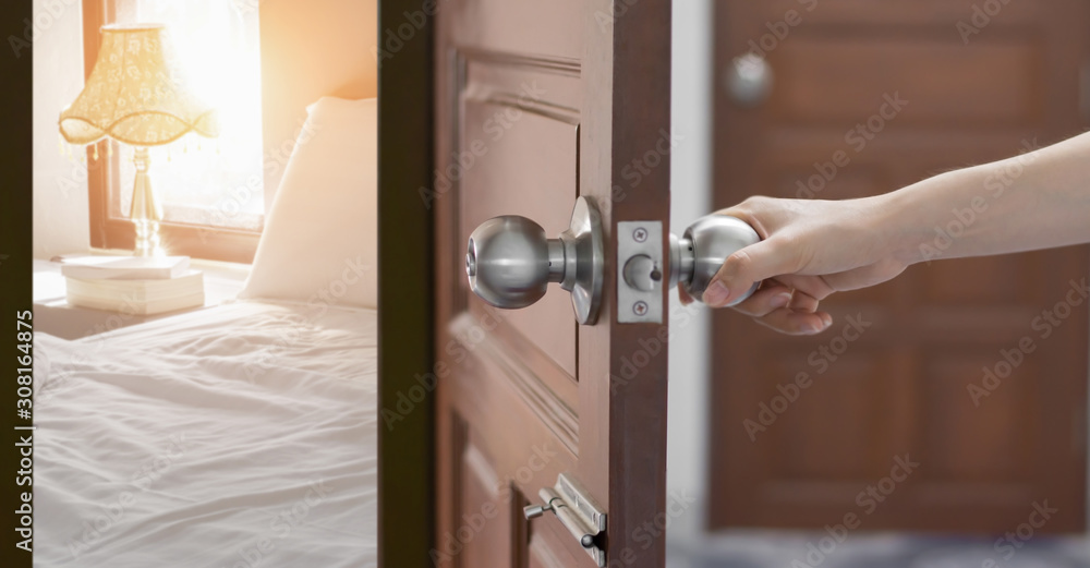Women hand open door knob or opening the door,grand opening,Close up ...