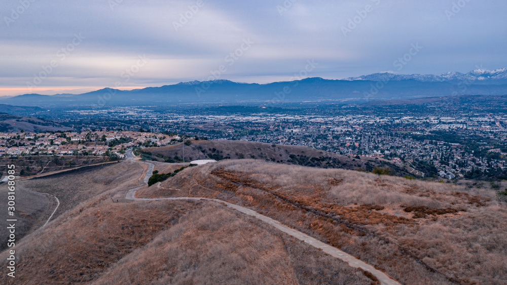 Aerial view of open rolling hills in suburban Southern California ...