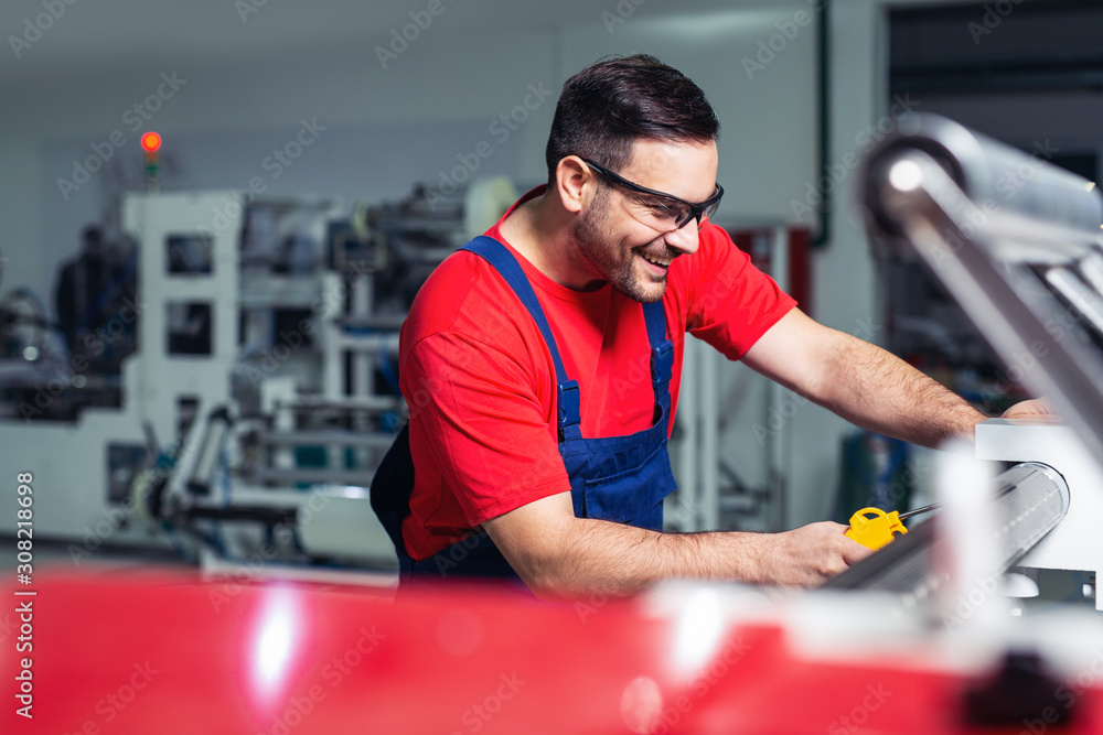 Maintenance engineer repair modern industrial machine. Stock Photo ...