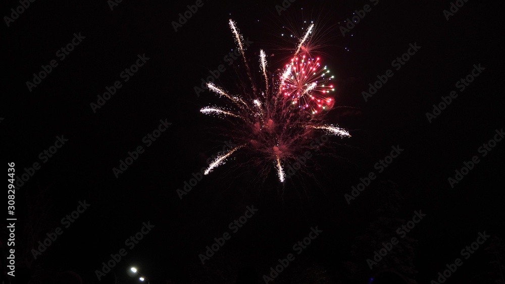 New year's eve fireworks celebration. shining fireworks with bokeh ...
