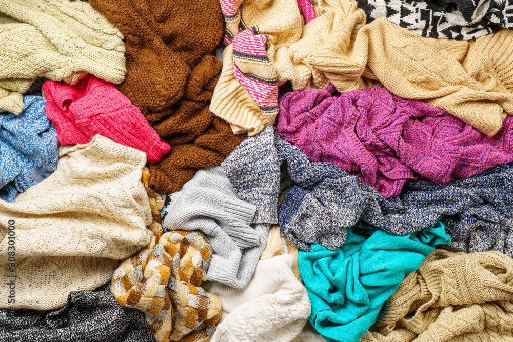 A Bunch of Different Clothes. Recyclable Textile Background. Sorting at ...