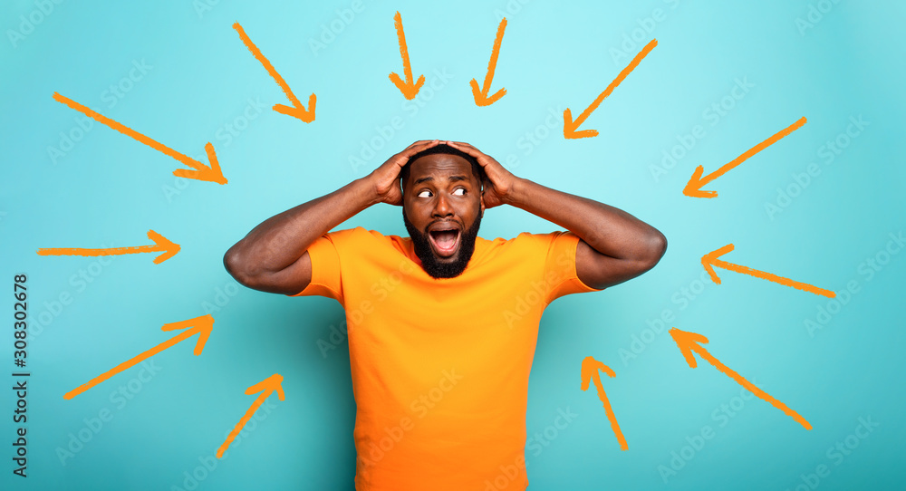 Feared, confused and shocked expression of a boy followed by arrows ...